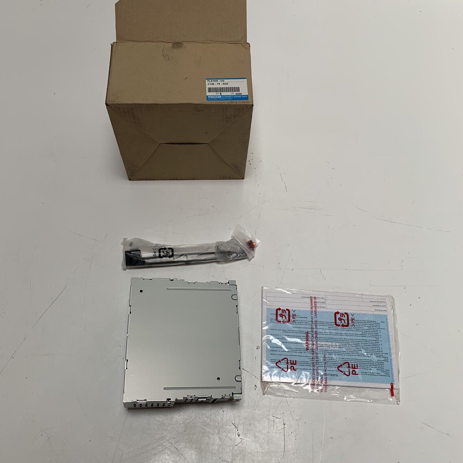 Genuine Mazda CD player brand new C14679AG0 – Genuine Parts Ltd