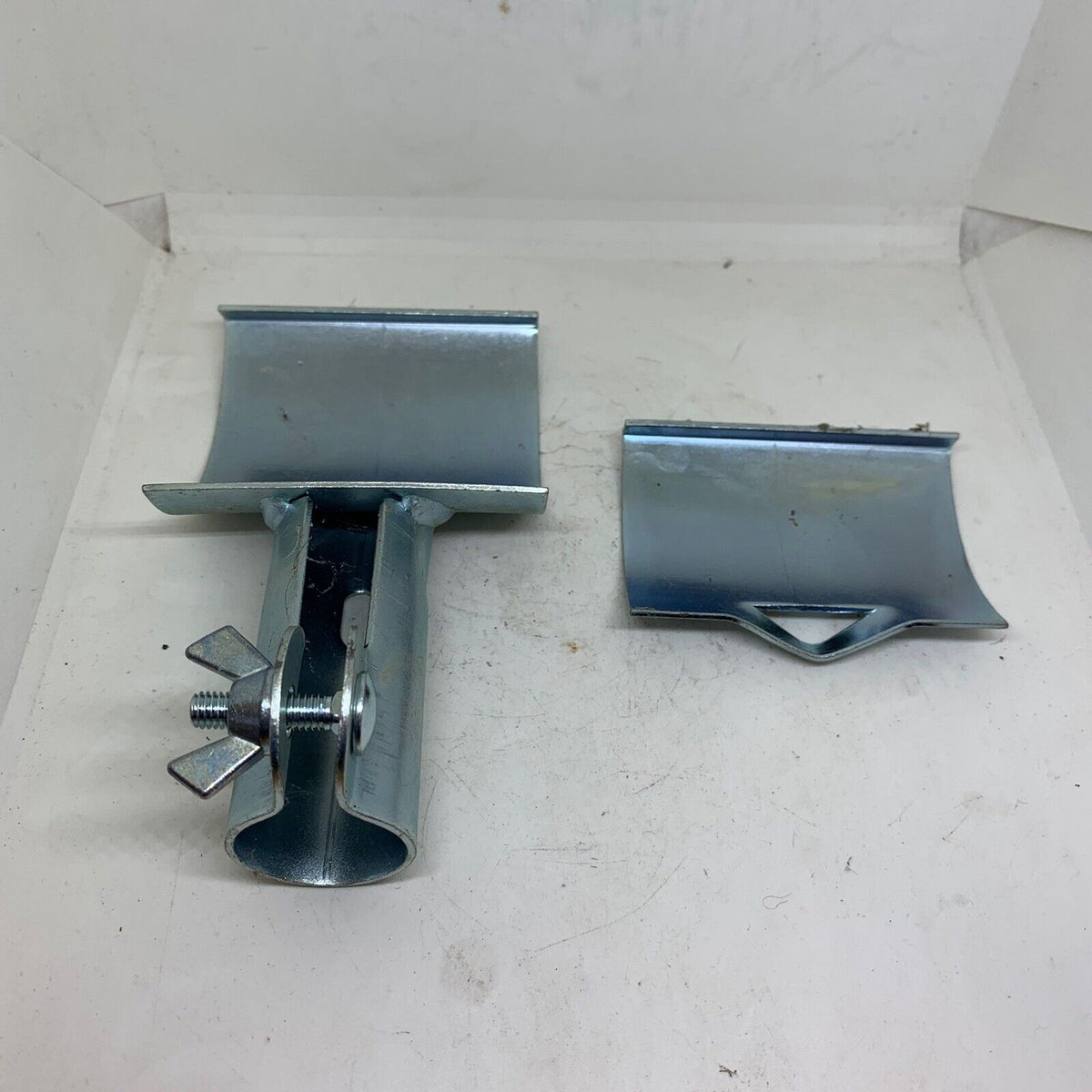 BRUSH/SCRAPER BRACKET BRAND NEW – Genuine Parts Ltd